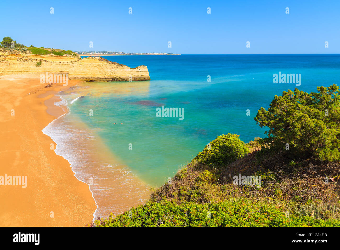 View of beautiful sandy beach and turquoise sea in Armacao de Pera ...