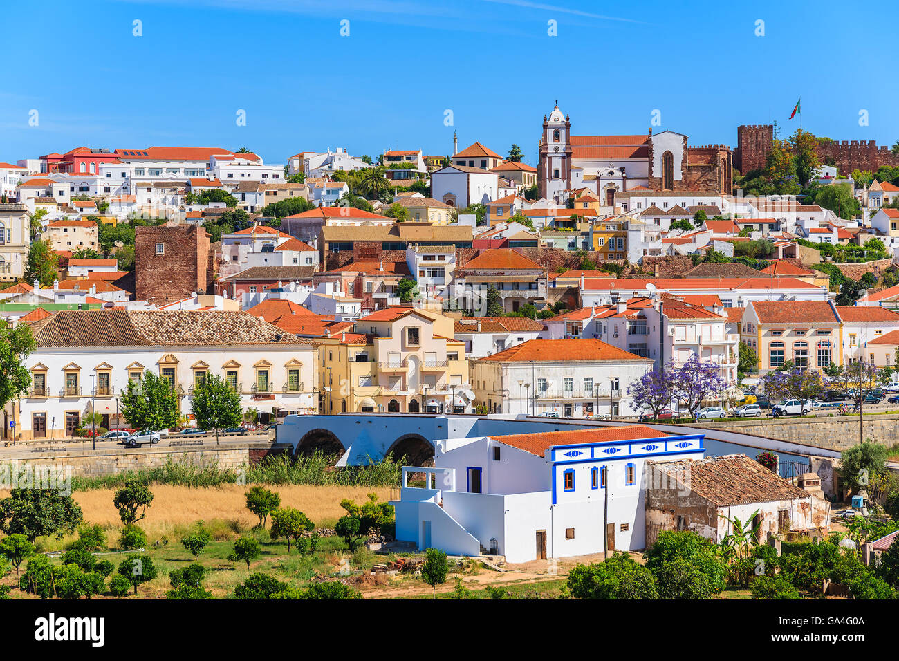 View of Silves town buildings with famous castle and cathedral, Algarve ...