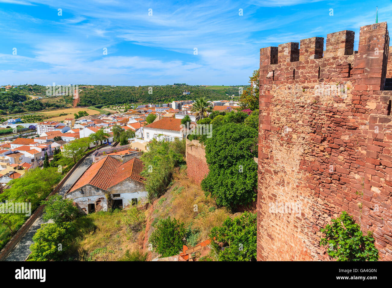 View of Silves town with colorful houses from castle, Algarve region ...