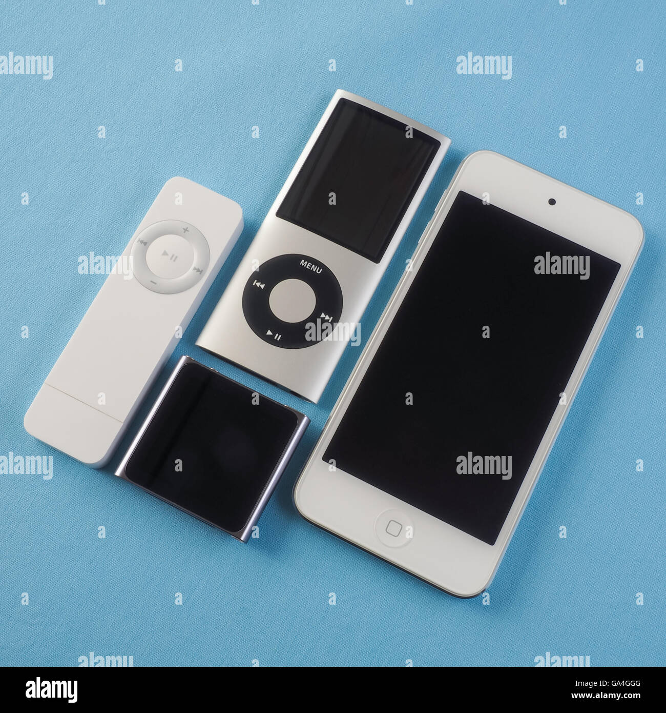 Collection of four Apple iPods Stock Photo - Alamy