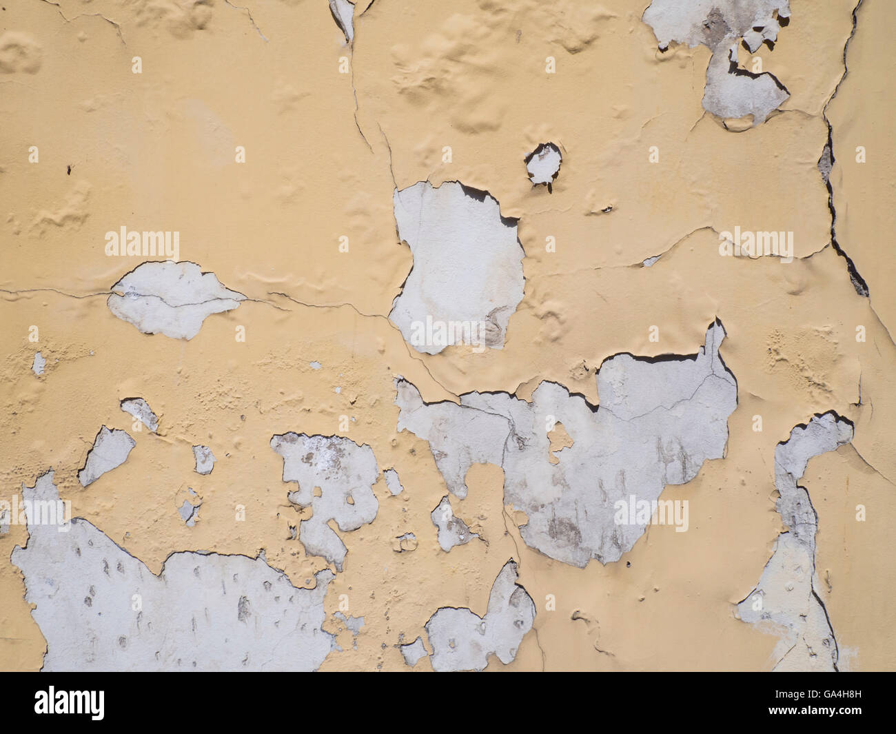 Cracking and peeling paint on a wall Stock Photo - Alamy