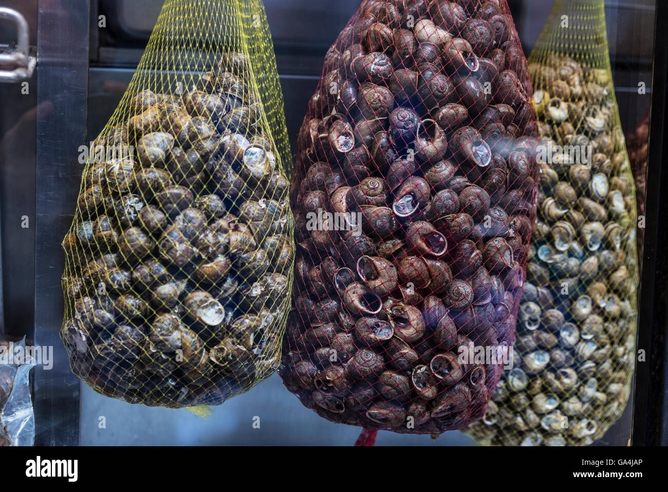 Bag full of different kinds of snails on the market of La Boqueria ...