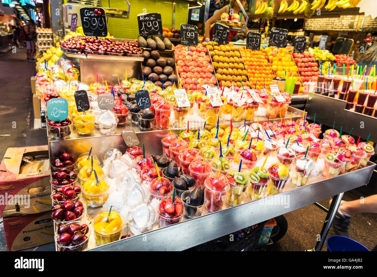 Fruit stand with smoothies ready to take on the market of La Boqueria ...