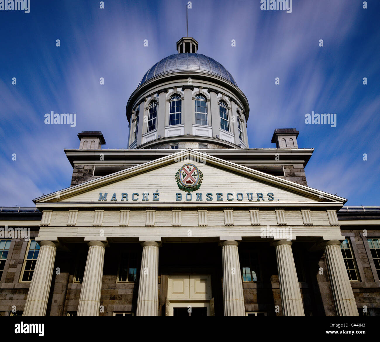 Long exposure with moving clouds over Marche Bonsecours, Montreal ...