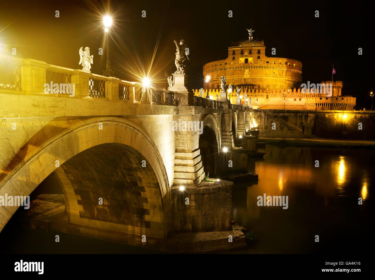 Bridge to castle Sant Angelo in the night Stock Photo - Alamy