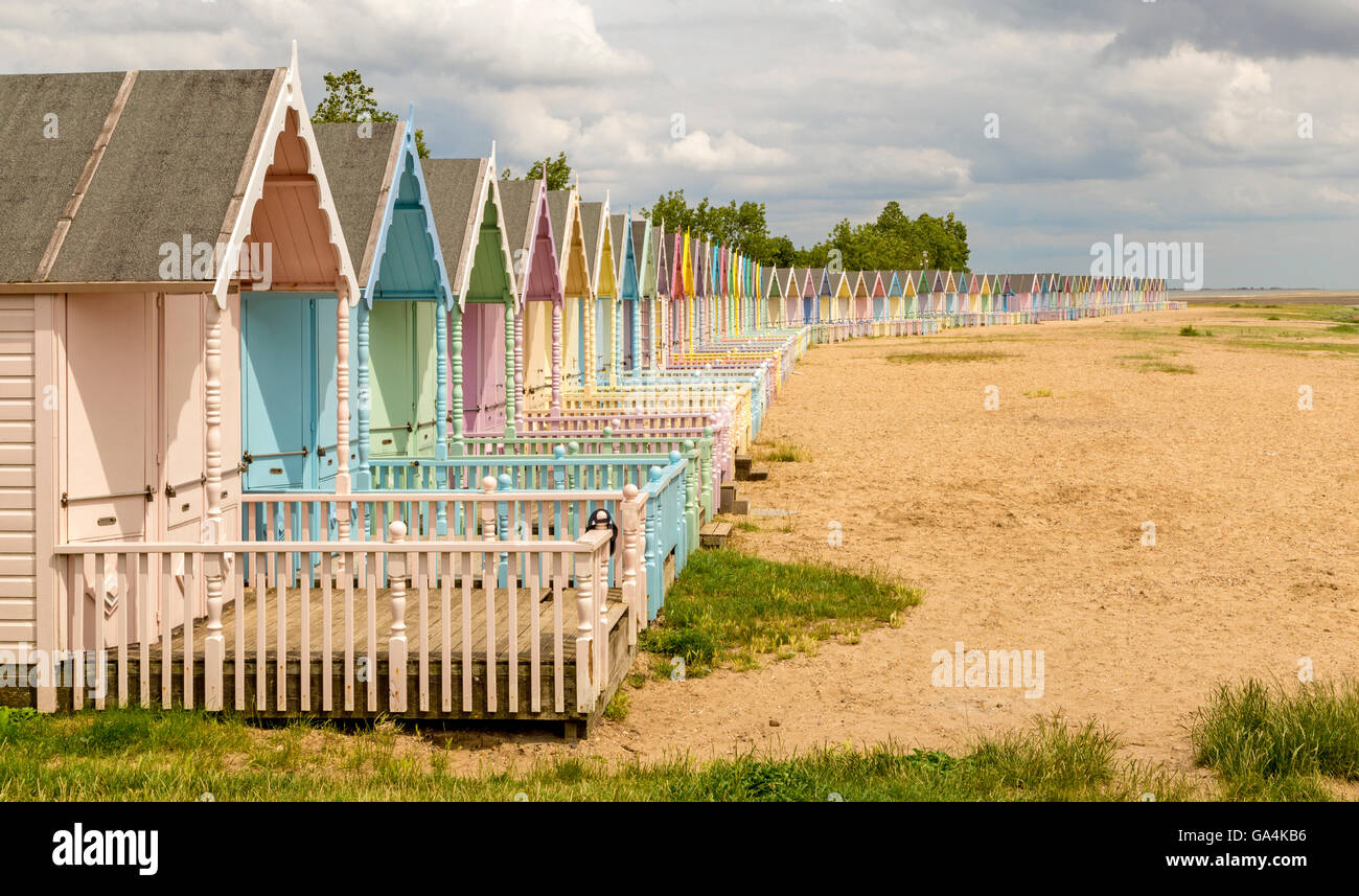 Soft pastel colored beach huts in West Mersea, Mersea Island, Essex ...