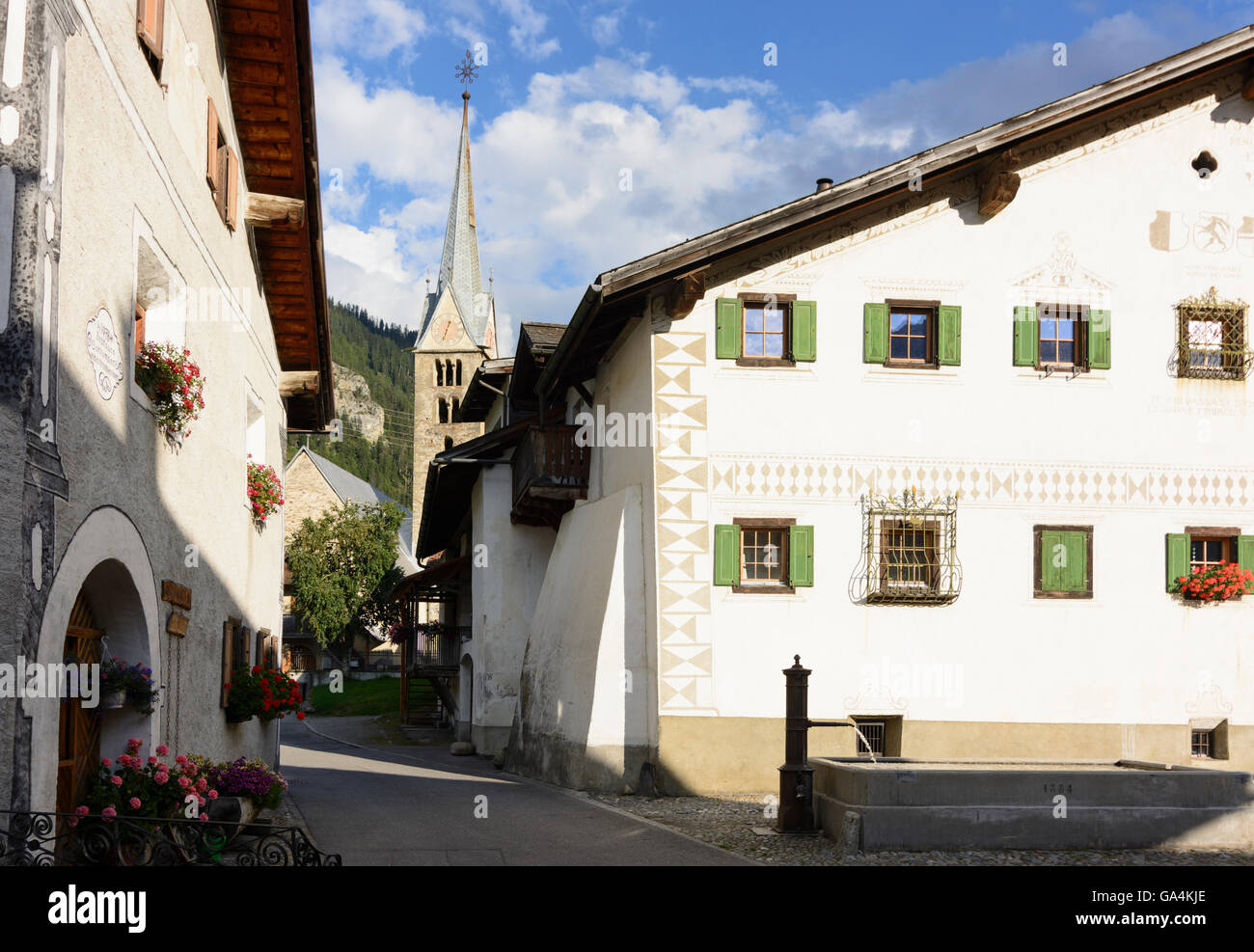 Bergün/Bravuogn Old town with houses in the Engadine style and the ...