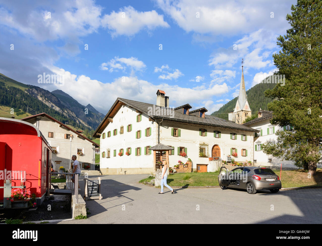 Bergün/Bravuogn Old town with houses in the Engadine style and the ...