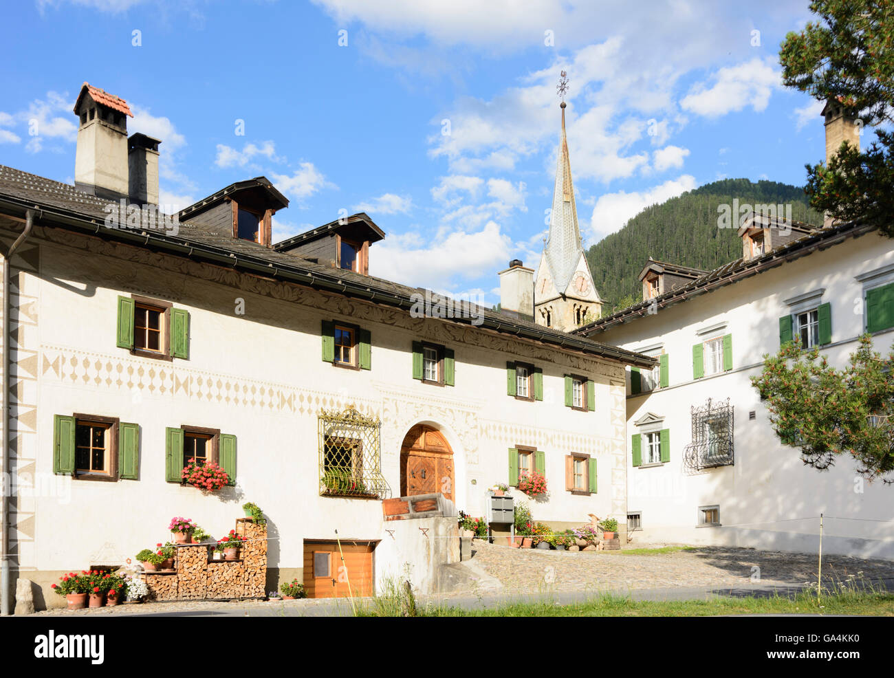 Bergün/Bravuogn Old town with houses in the Engadine style and the ...