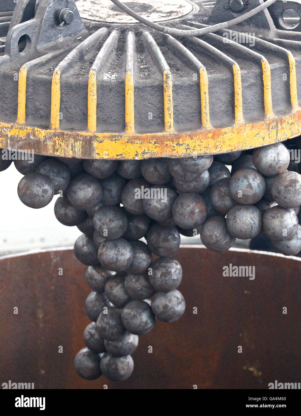 Magnet holds grinding balls when loading Stock Photo - Alamy