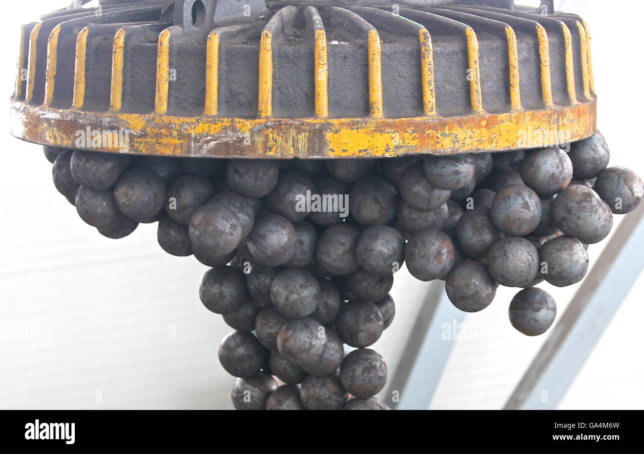 Magnet holds grinding balls when loading Stock Photo - Alamy