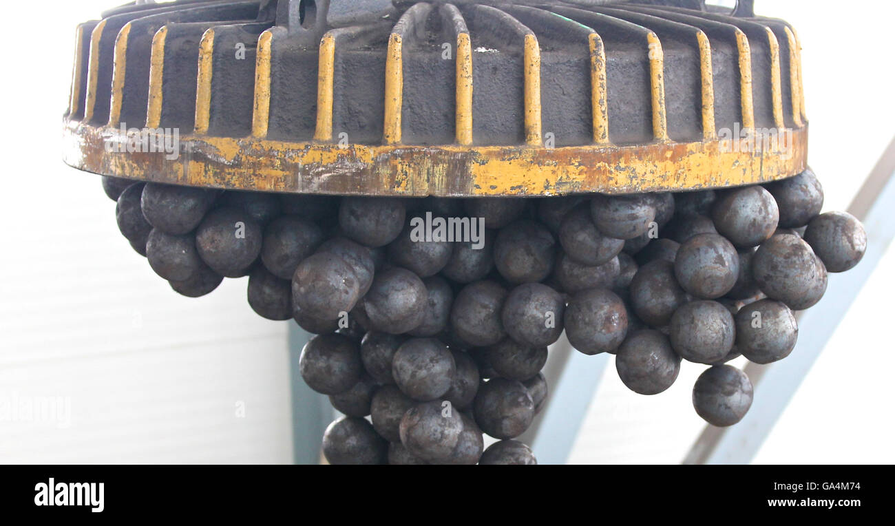 Magnet holds grinding balls when loading Stock Photo - Alamy
