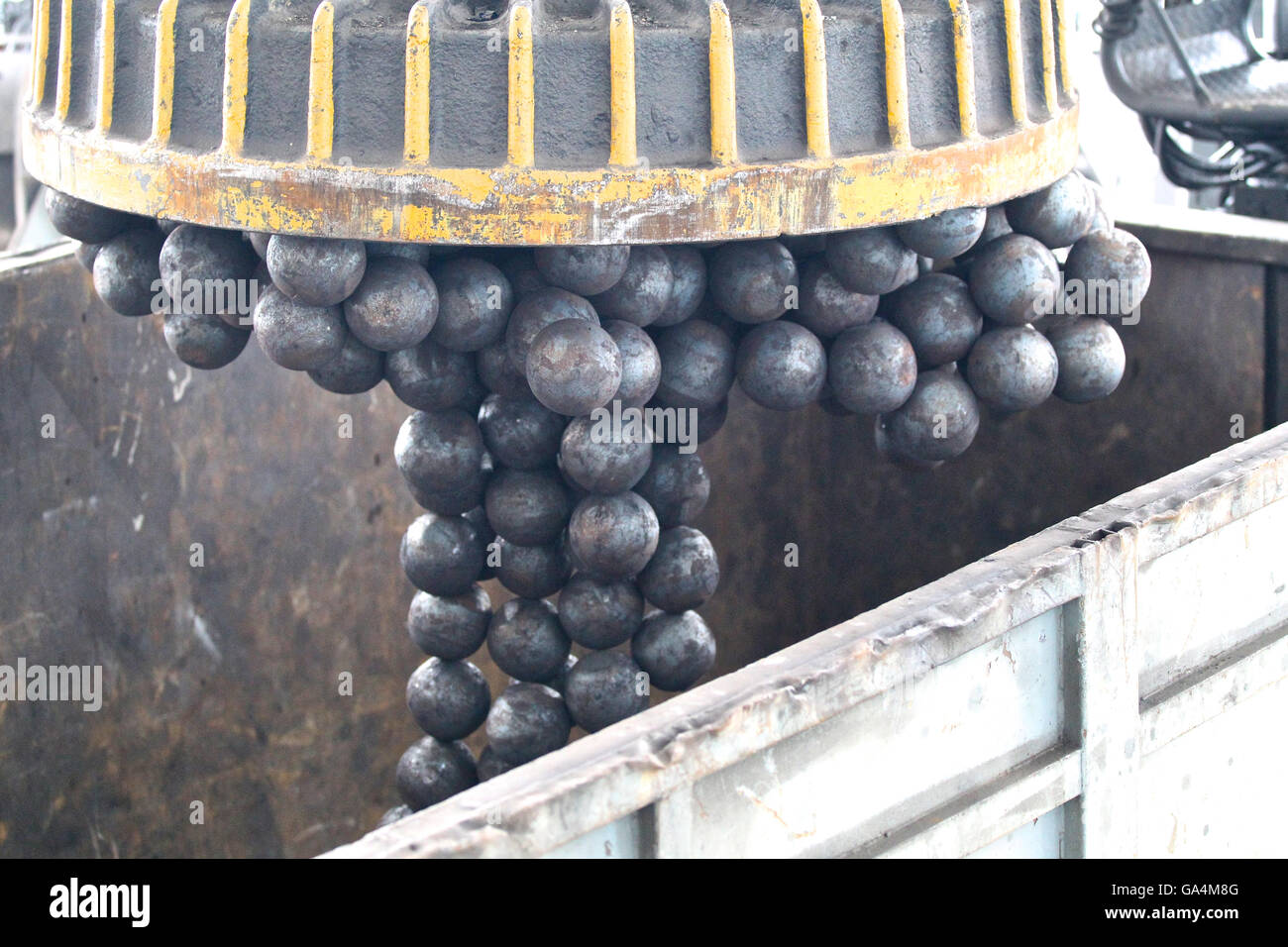Magnet holds grinding balls when loading Stock Photo - Alamy
