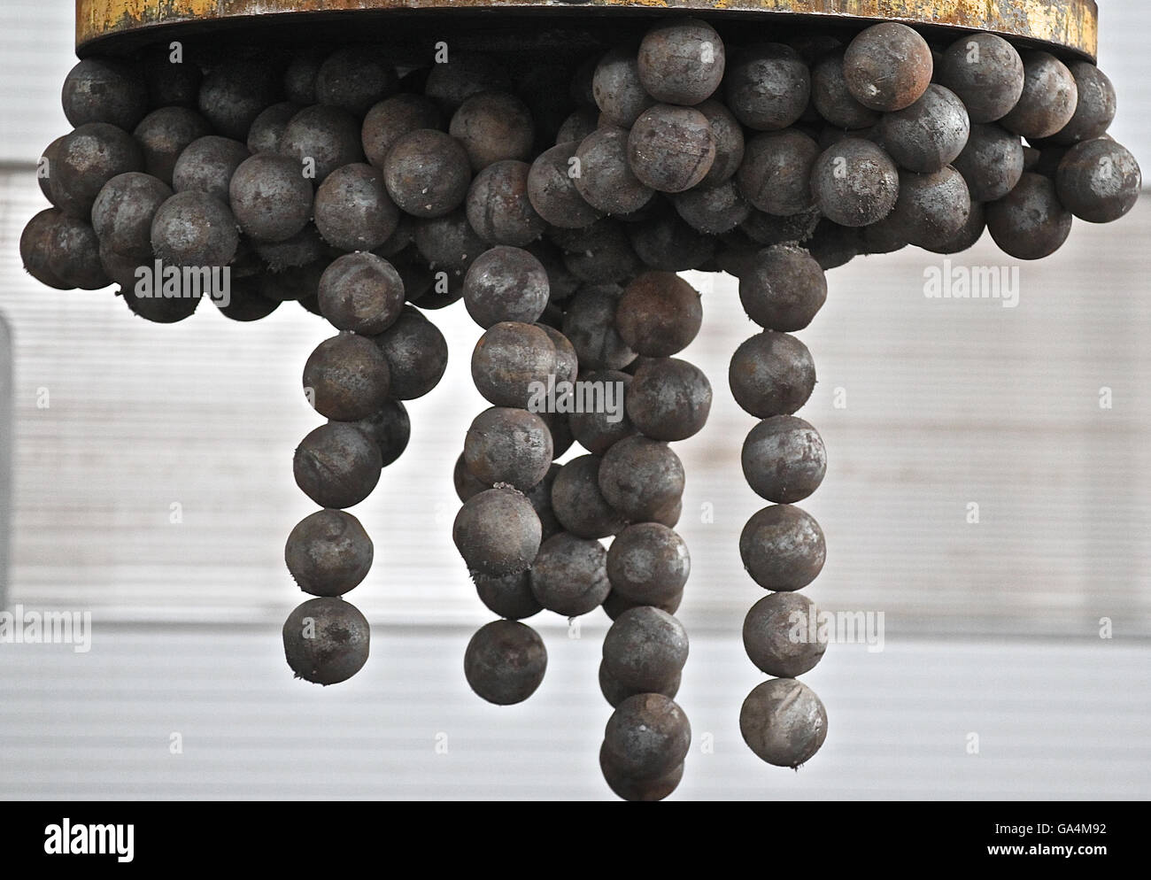 Magnet holds grinding balls when loading Stock Photo - Alamy
