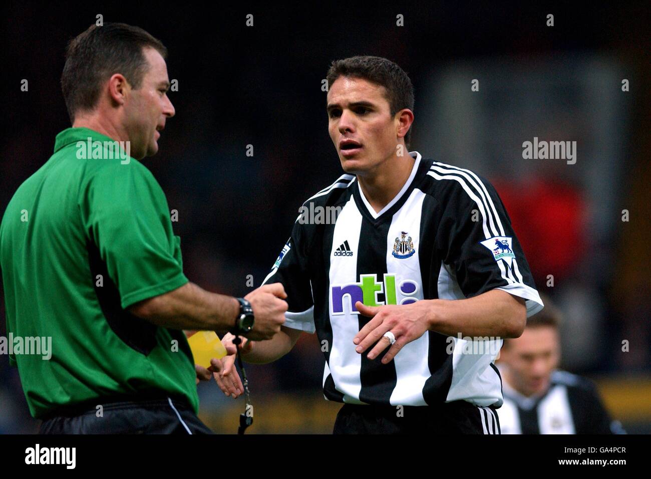 Newcastle United's Laurent Robert pleads with referee Rob Styles Stock ...