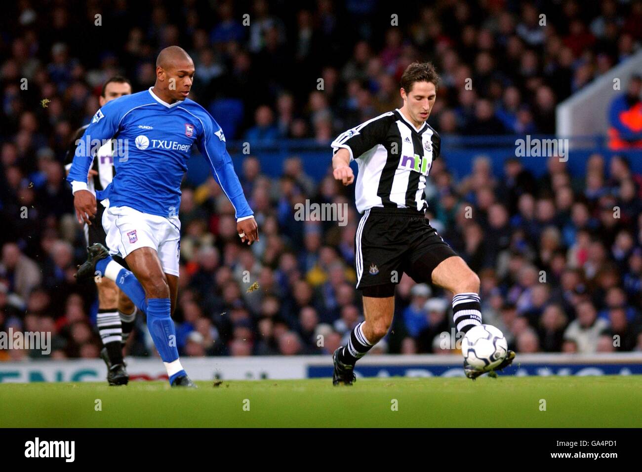 Newcastle United's Robbie Elliott on the ball threatened for a ...