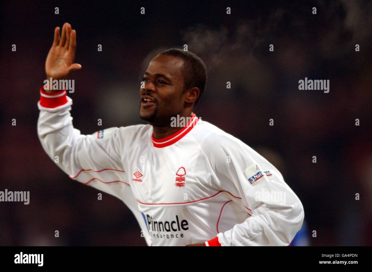 Stern John of Nottingham Forest celebrates scoring the opening goal ...