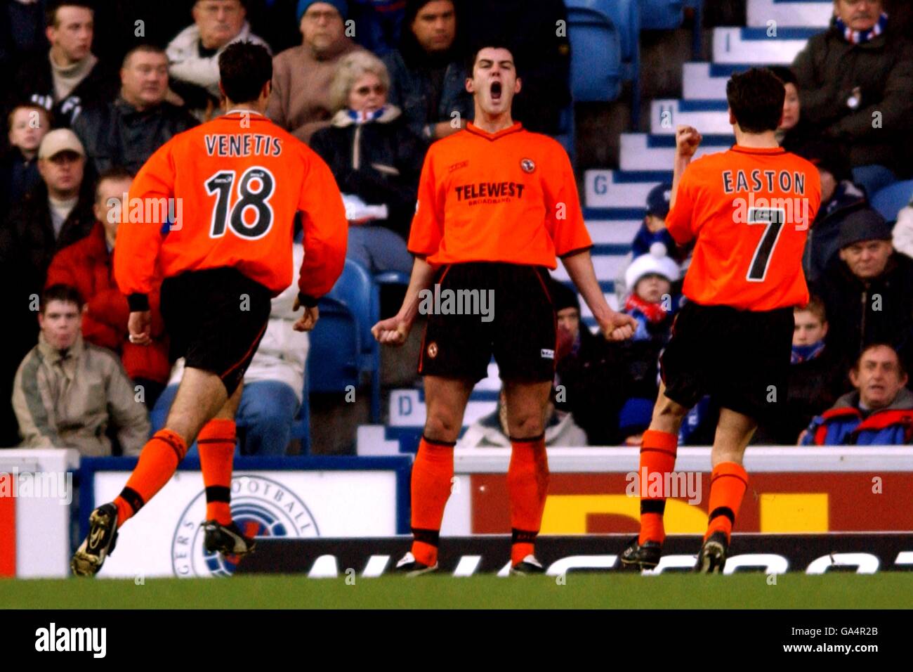 Dundee United's Steven Thompson (c) celebrates scoring the equalising ...
