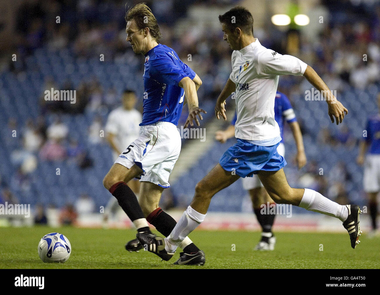 Rangers' Sasa Papac and FK Zeta Bojan Ivanovic (right) in action during ...