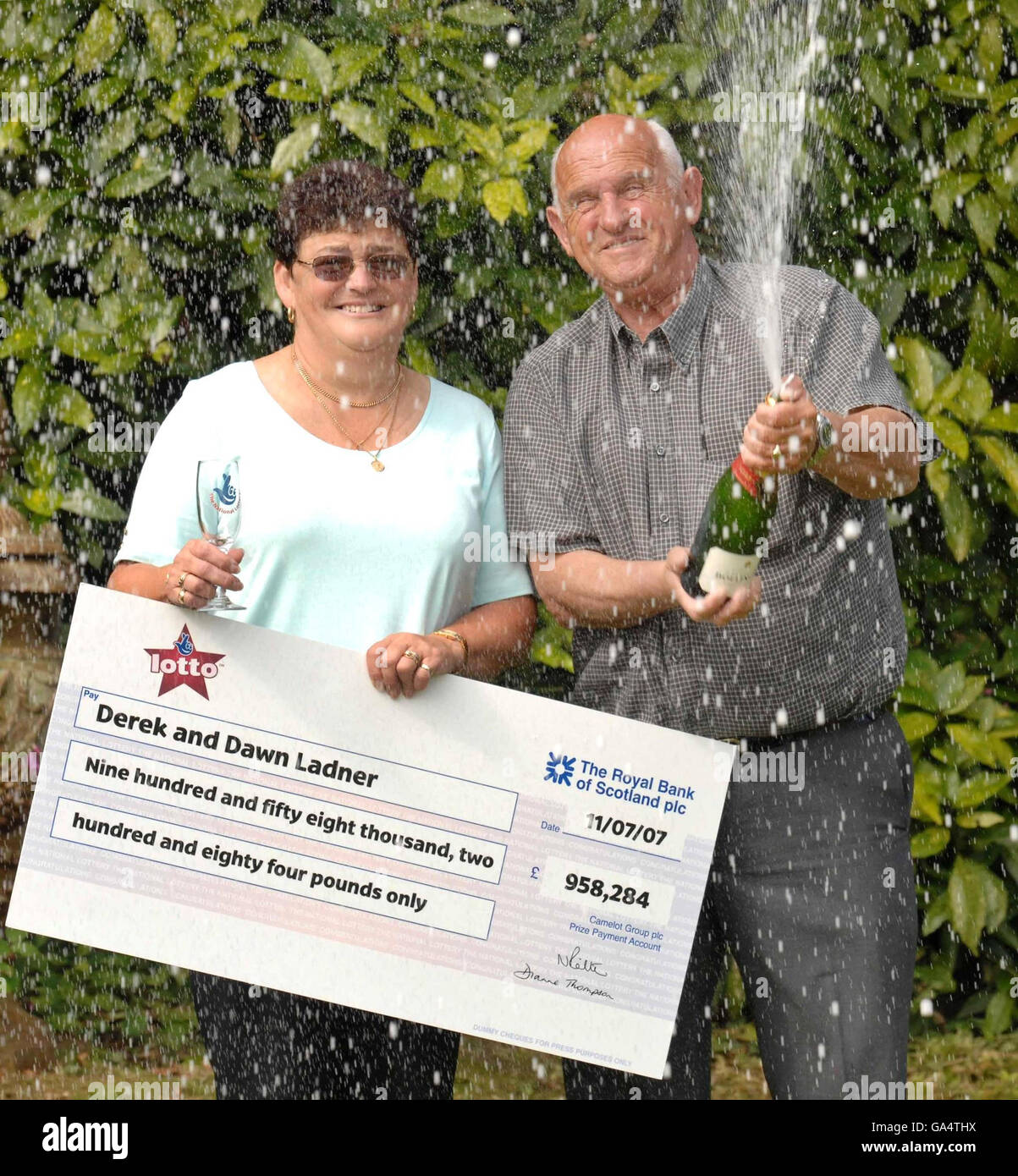 Double Lotto winners celebrate Stock Photo - Alamy