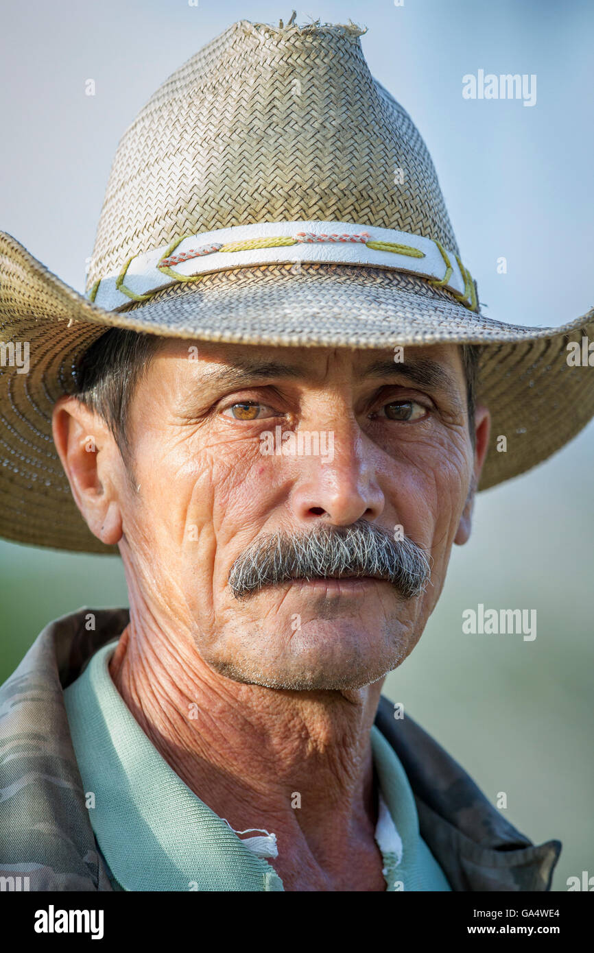 Cowboy on horseback on trail near Hacienda La Belen, a working ranch ...