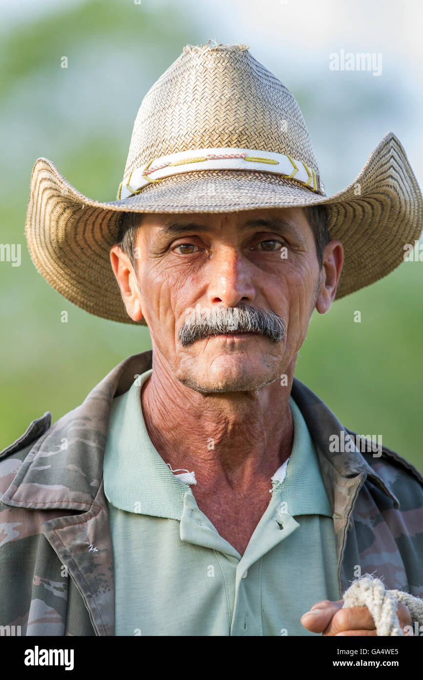 Cowboy on horseback on trail near Hacienda La Belen, a working ranch ...