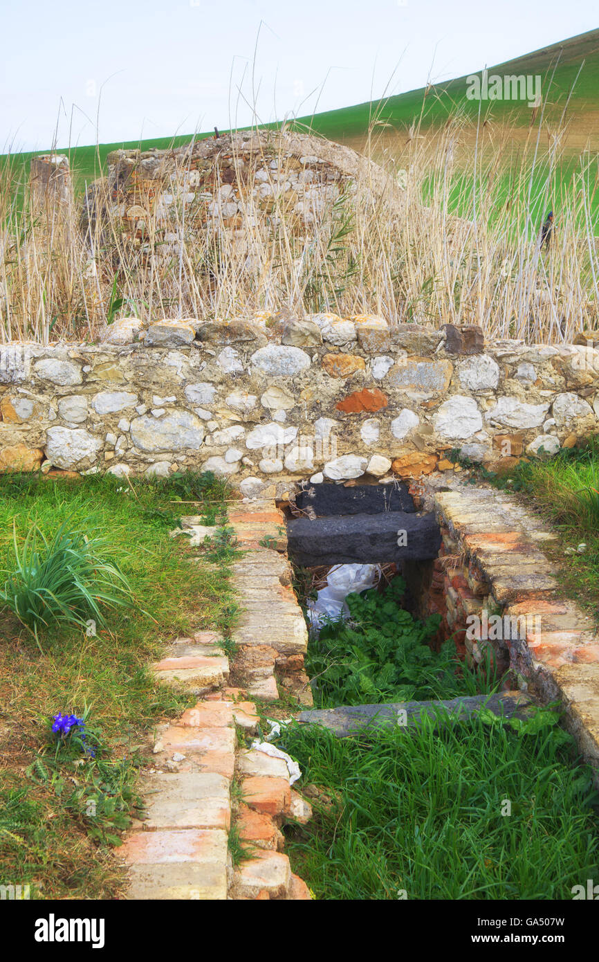 Rural cistern in Sicily with water canals Stock Photo - Alamy