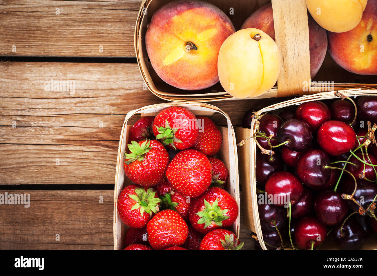 Fresh Ripe Summer Berries And Fruits Peaches Apricots Cherry