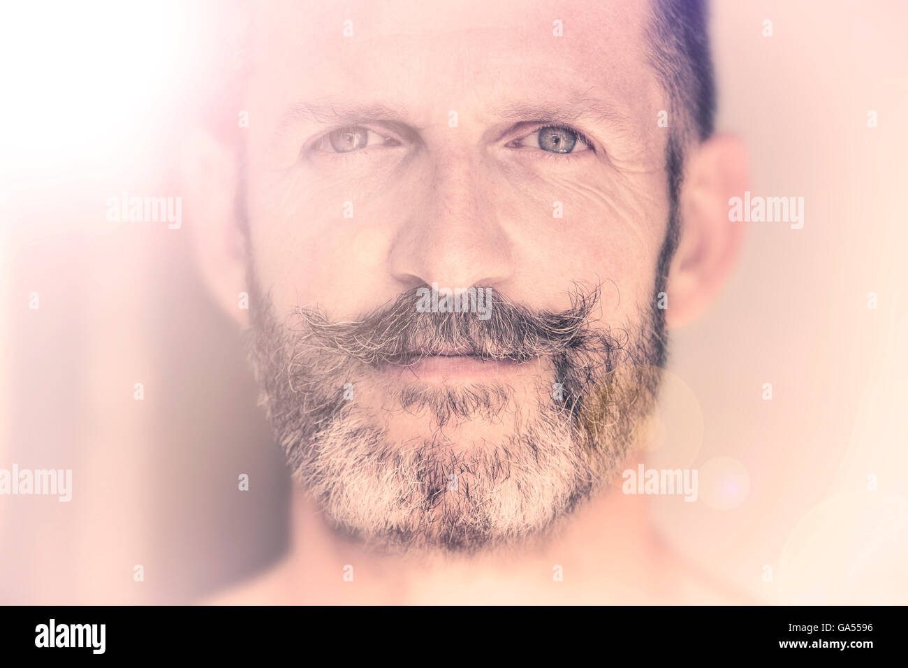 portrait of handsome man with beard and twirled mustache Stock Photo ...
