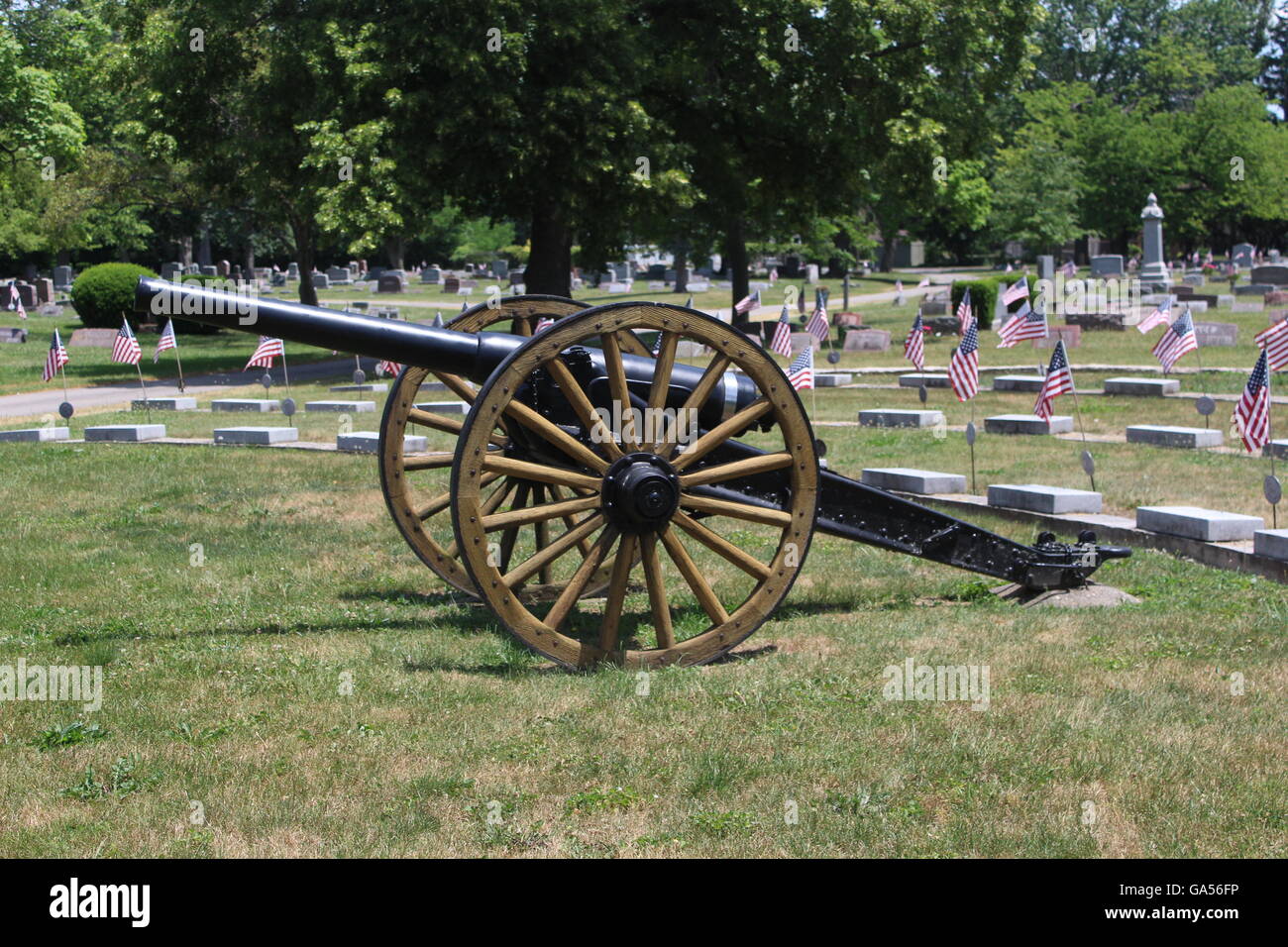 replica cannon sitting in cemetery Stock Photo - Alamy