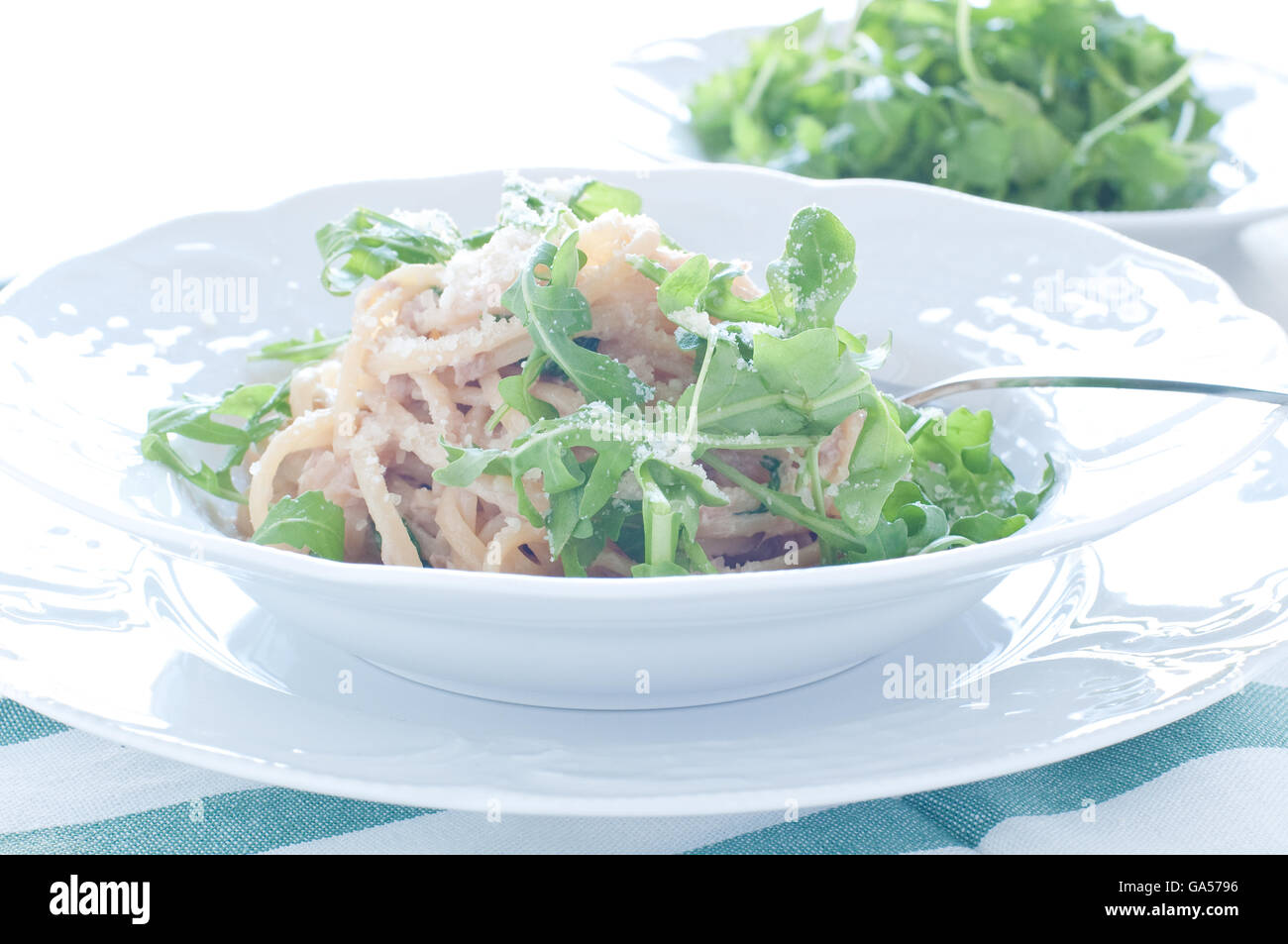 delicious pasta with tuna and rocket,italy background closeup cuisine ...