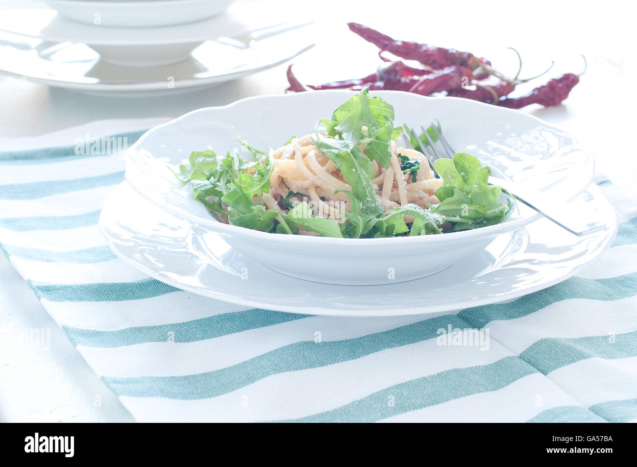 delicious pasta with tuna and rocket,italy background closeup cuisine ...