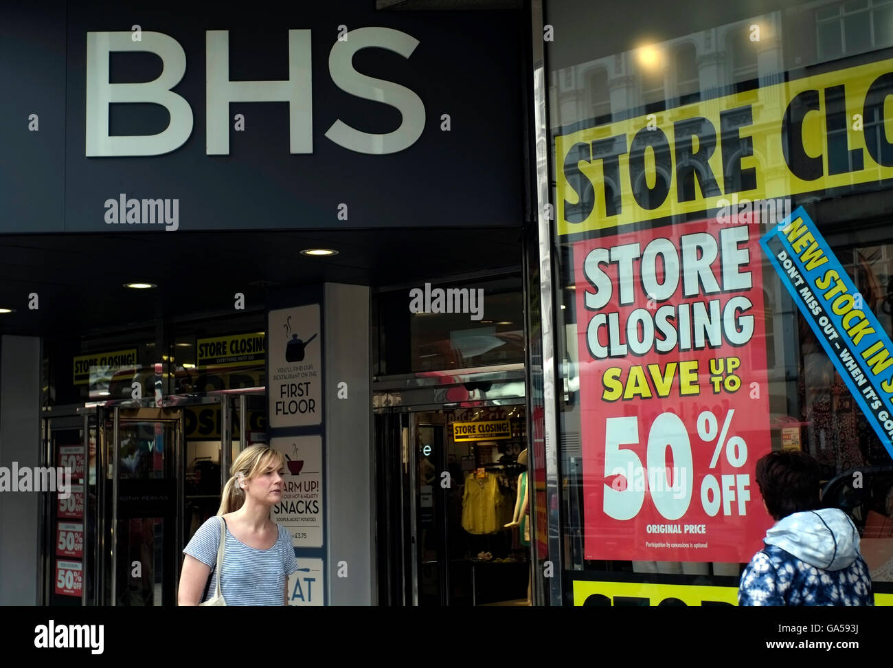 Pedestrians walk past the BHS department store in Oxford Street, London ...