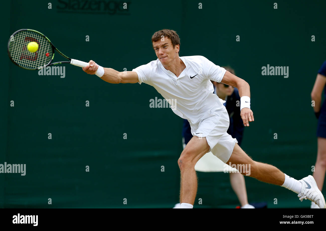 London, Britain. 2nd July, 2016. Andrey Kuznetsov of Russia hits a return to Kei Nishikori of ...