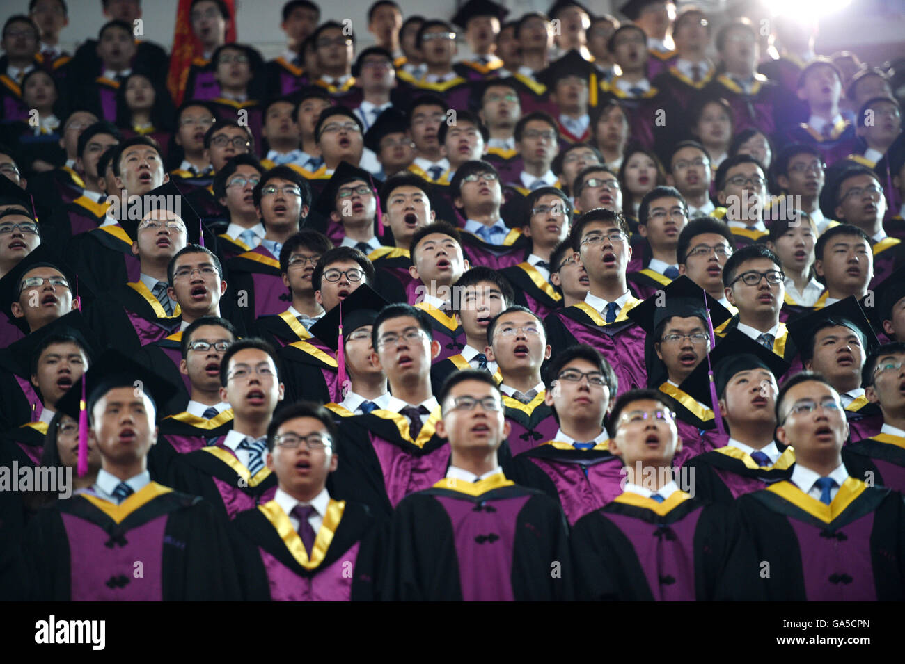 Beijing, China. 3rd July, 2016. Students sing the university anthem ...