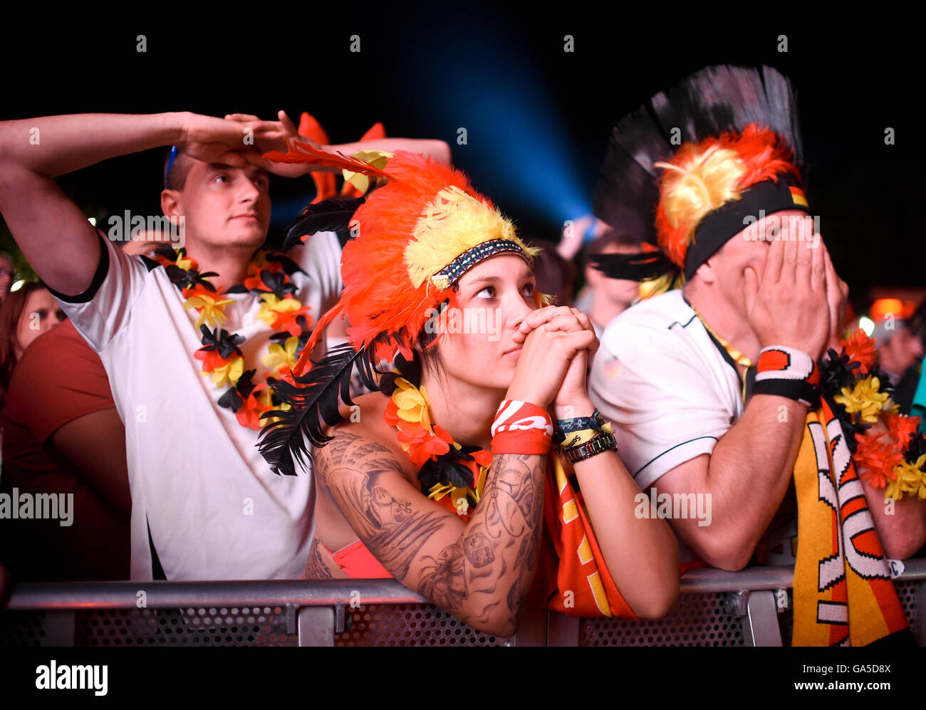 Berlin, Germany. 02nd July, 2016. Crowds of fans watching intensely ...