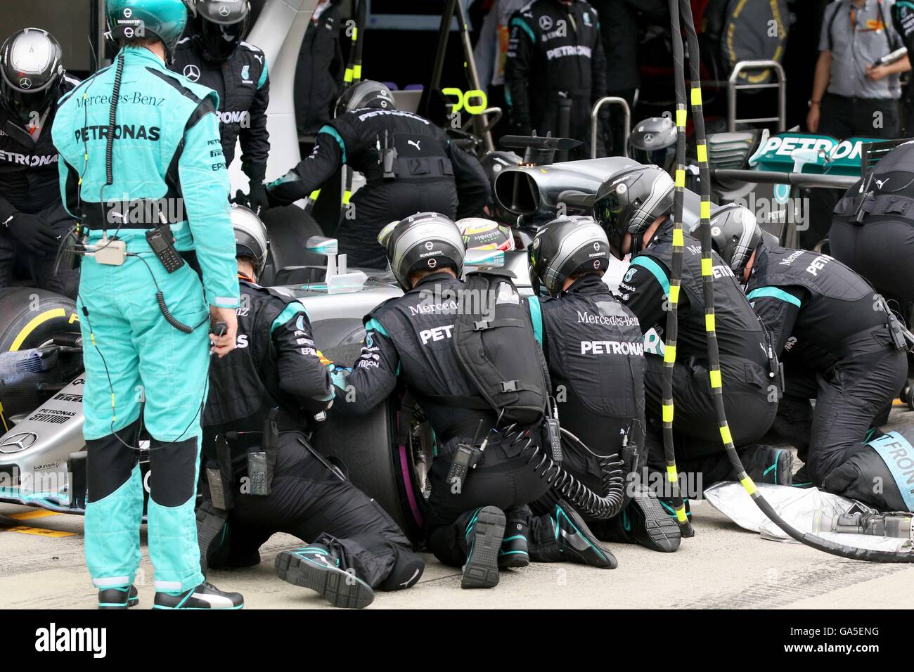 Mercedes driver Lewis Hamilton of Britain gets a pit service during the ...