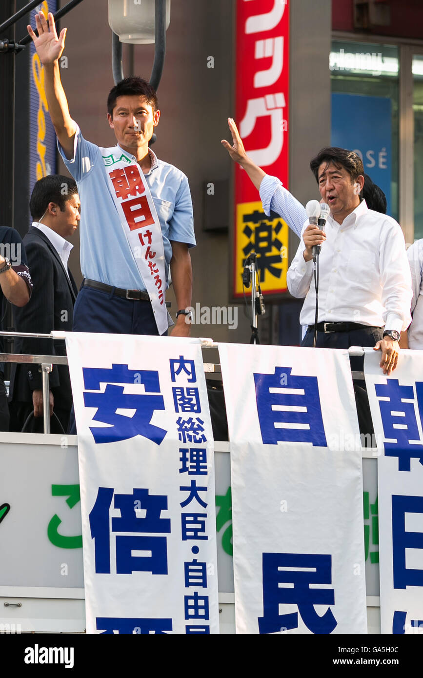 (L to R) Kentaro Asahi, former beach volleyball star and LDP candidate ...