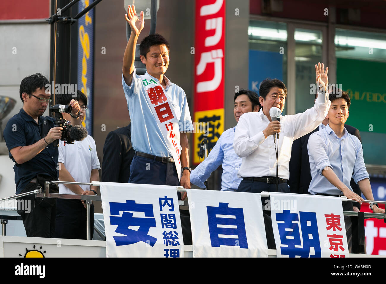 (L to R) Kentaro Asahi, former beach volleyball star and LDP candidate ...