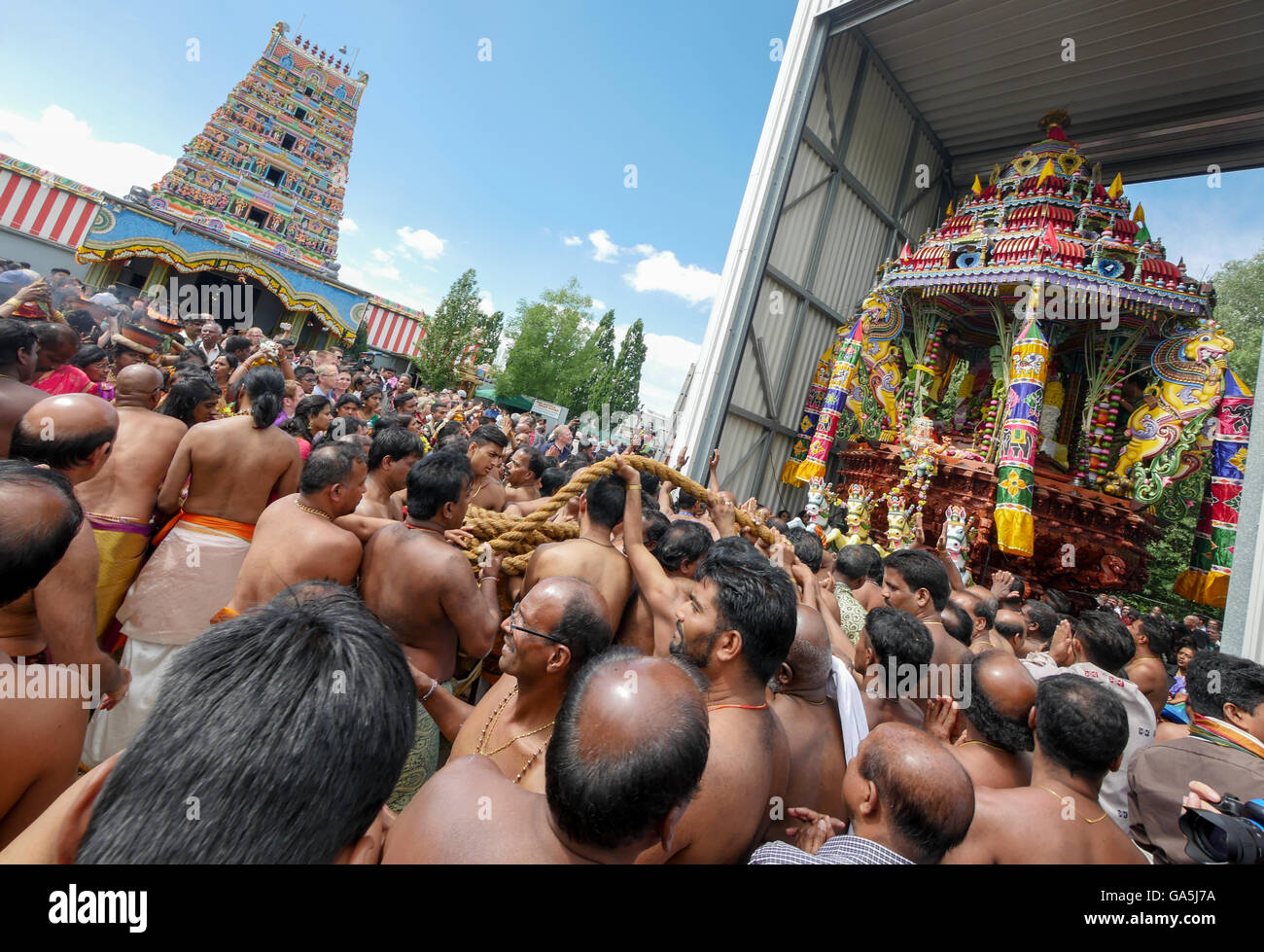 Believer pull the temple car of the goddess in the procession, Sri ...