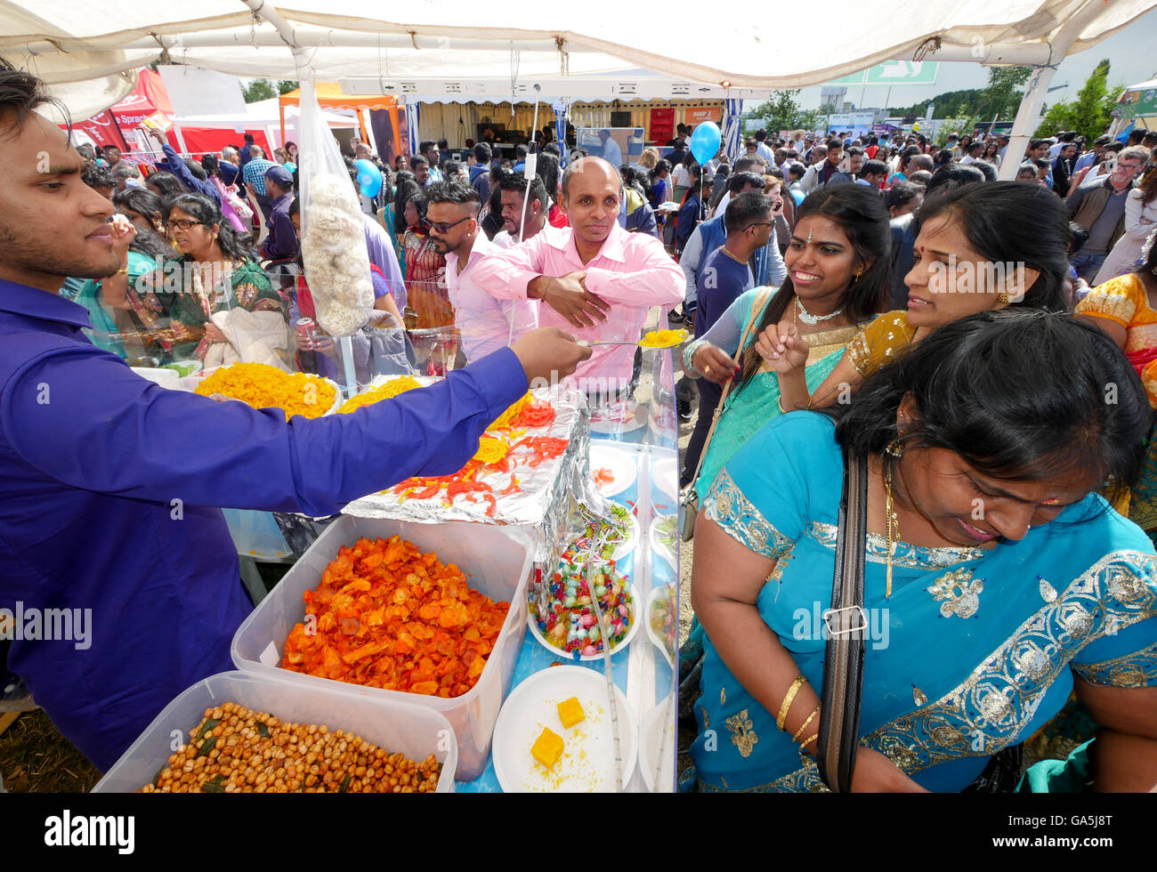 Dealer with sweets at the temple feast, Sri Kamadchi-Ampal Temple ...