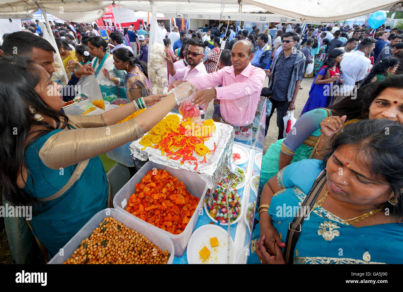Dealer with sweets at the temple feast, Sri Kamadchi-Ampal Temple ...