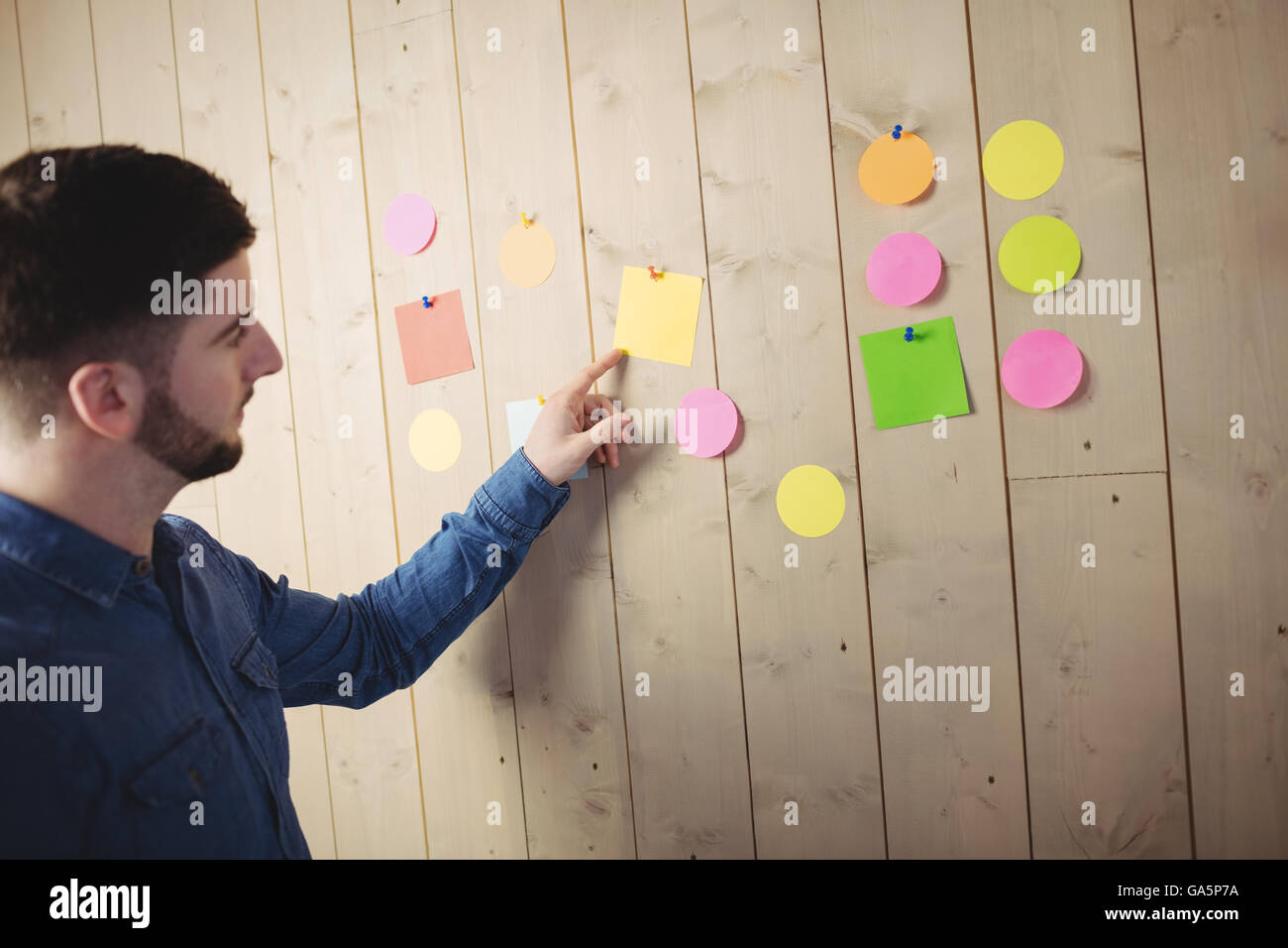 Young man working sticky notes hi-res stock photography and images - Alamy
