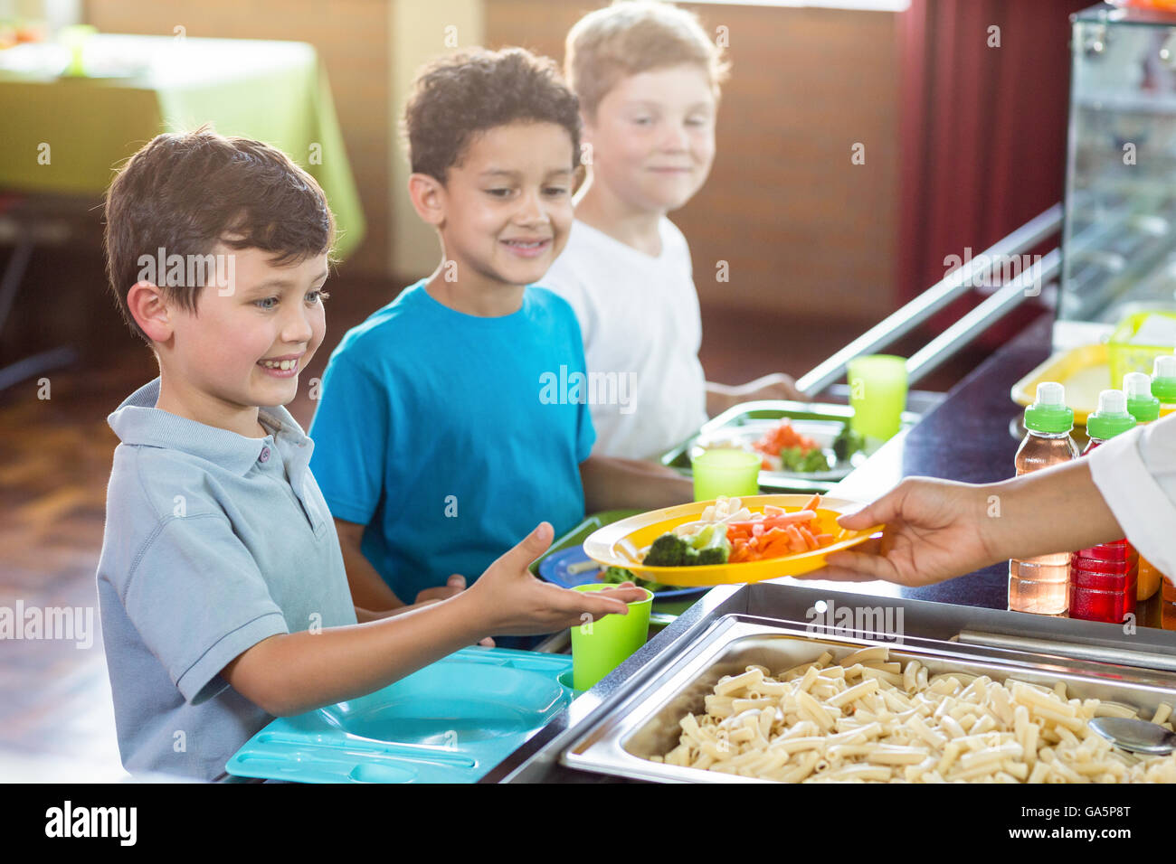 Woman hand serving food hi-res stock photography and images - Alamy
