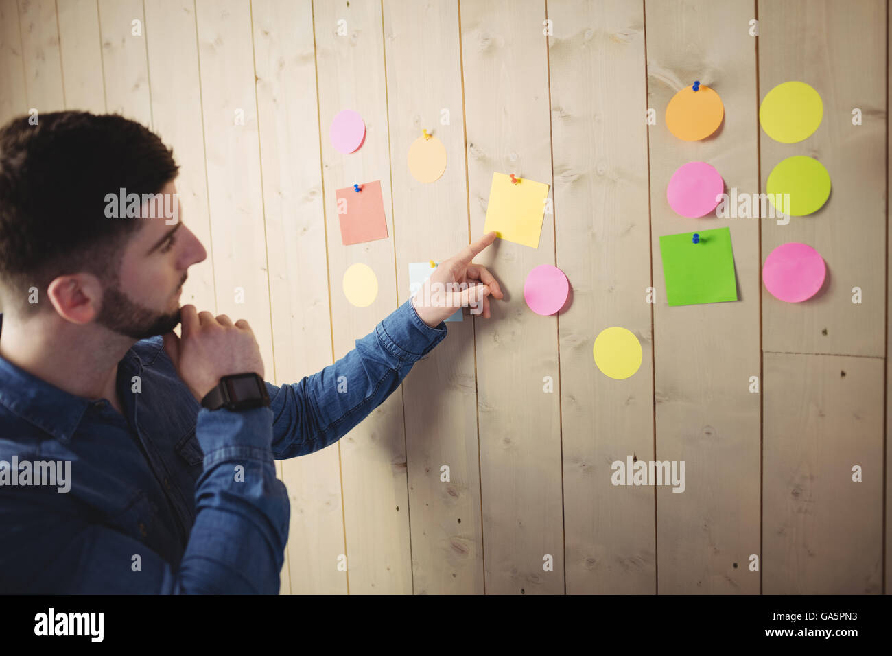 Young man working sticky notes hi-res stock photography and images - Alamy