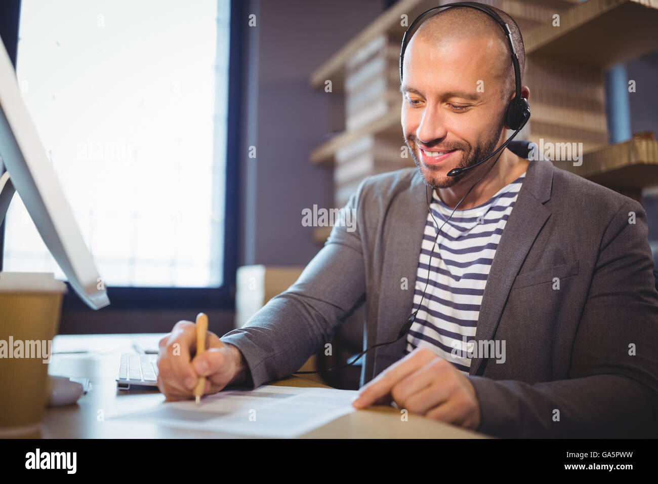Businessman writing on documents hi-res stock photography and images ...