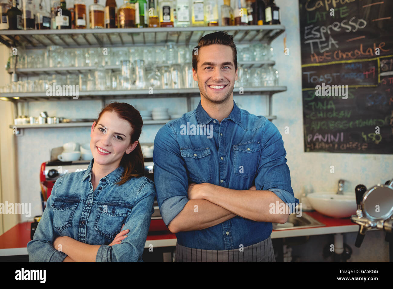 Portrait of happy co-workers at cafeteria Stock Photo - Alamy