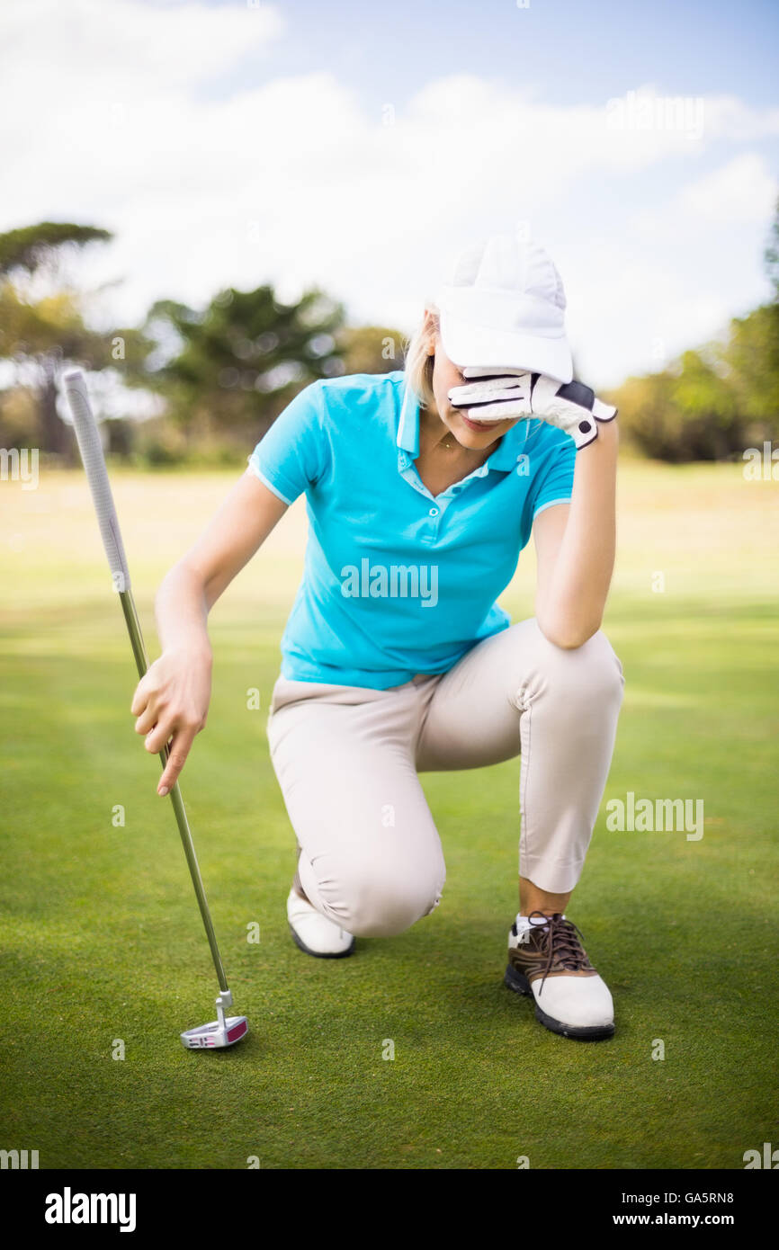 Woman holding clothing to face hi-res stock photography and images - Alamy