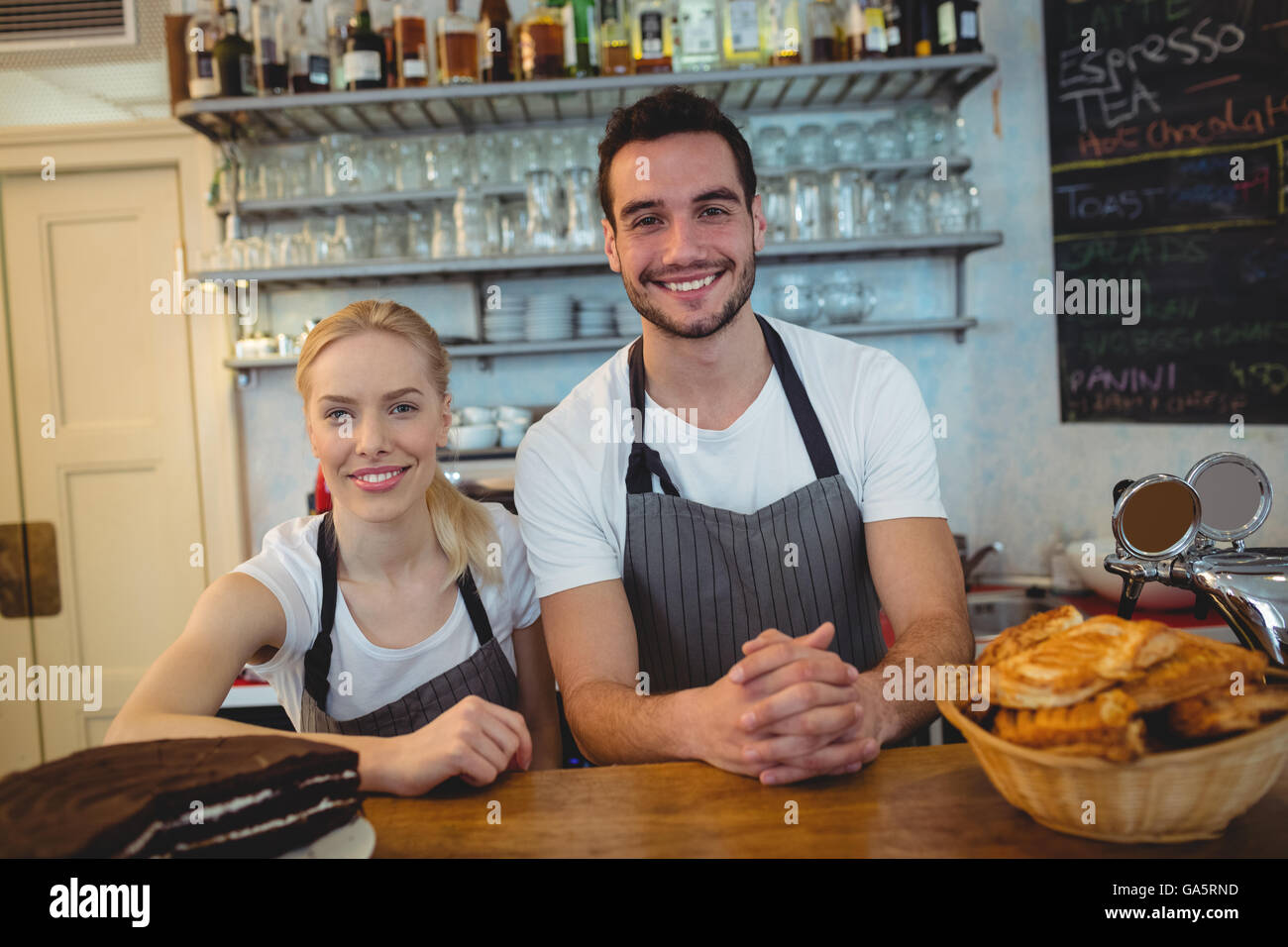 Portrait of happy employees at cafe Stock Photo - Alamy