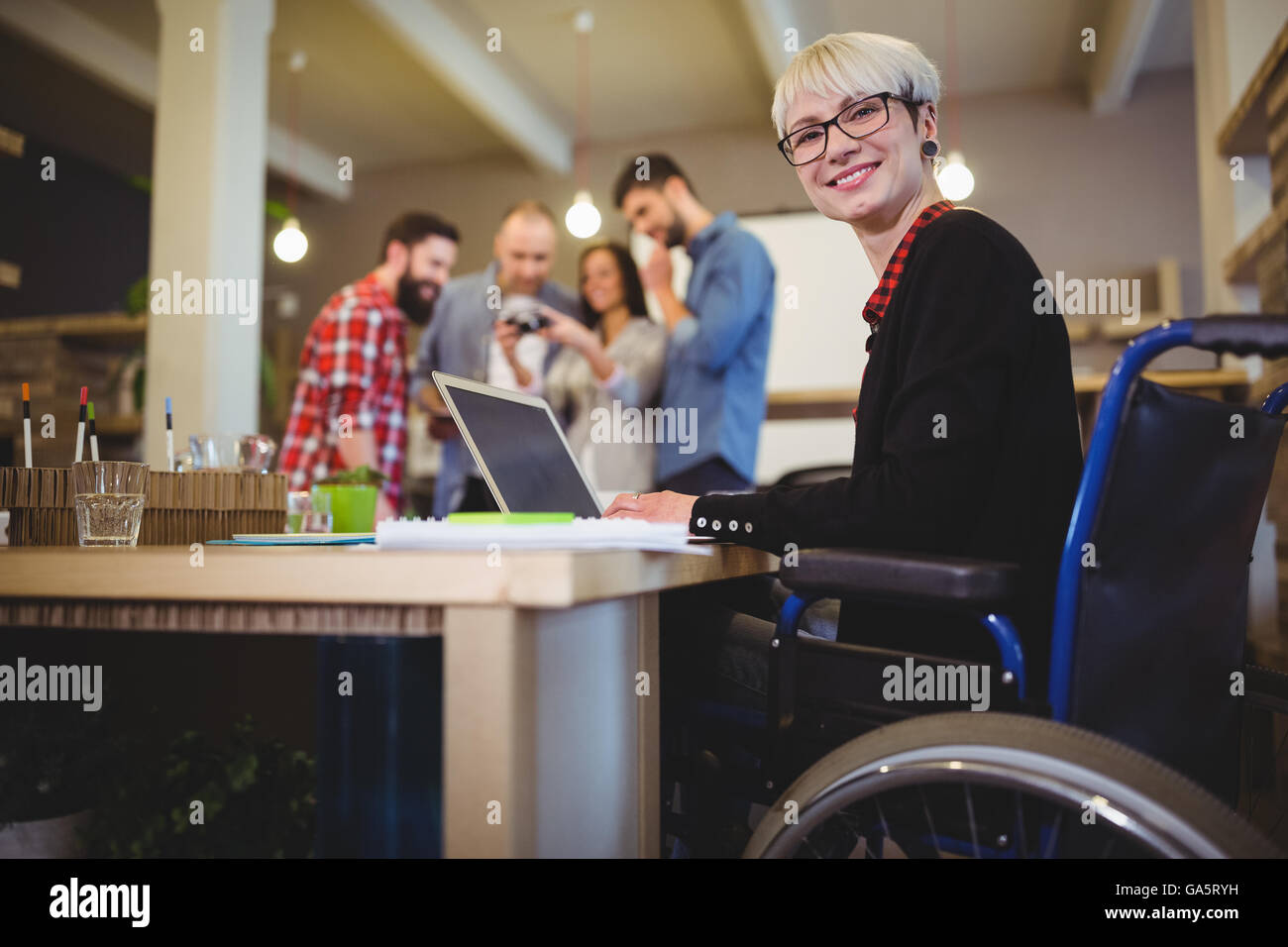 Disabled man using computer typing hi-res stock photography and images ...